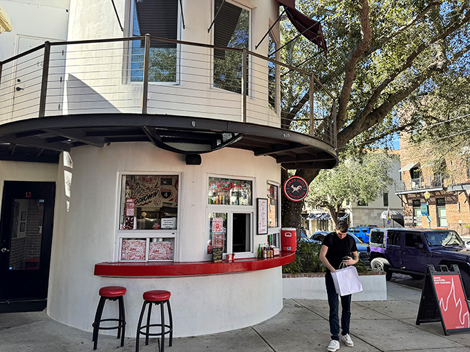 The round white window to chicken paradise &ndash; where hot chicken dreams come true beneath the Florida sun.