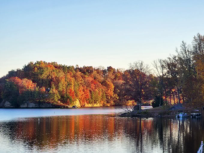 Morning mist rises from Lake Malone's surface, creating a dreamy landscape that feels almost too perfect to be real.