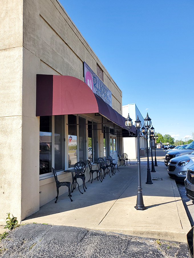 Rhodes Family Diner stands proudly beside Medina's locomotive mural, serving fuel for humans that's far tastier than what powers trains.