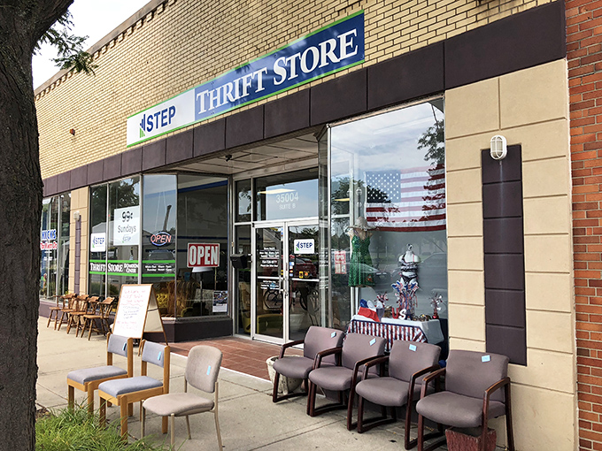 STEP Thrift Store's charming storefront with sidewalk furniture is like your neighbor saying, "Come browse awhile!"