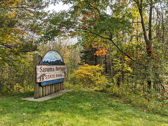 Savanna Portage welcomes visitors with a sign that understates the adventure waiting beyond – classic Midwestern modesty.