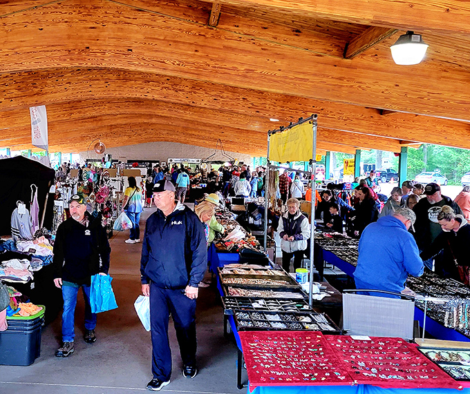 St. Germain's wooden pavilion shelters browsers from weather while they hunt for North Woods treasures.