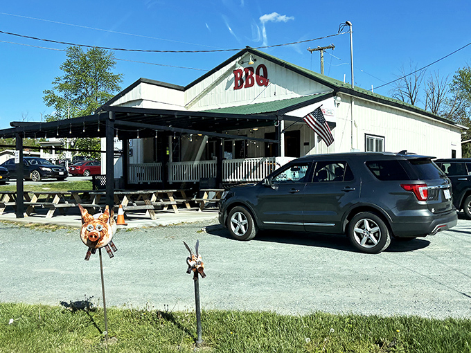 The BBQ Exchange's white farmhouse charm brings Norman Rockwell vibes to your plate of perfectly smoked ribs.
