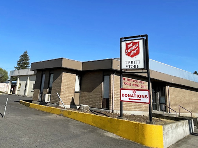 Behind this unassuming Salvation Army sign lies a wonderland of affordable furniture and household treasures waiting to be discovered.