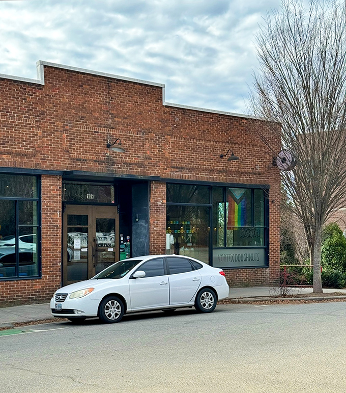 Vortex's historic brick building houses modern donut magic in Asheville's eclectic food scene.