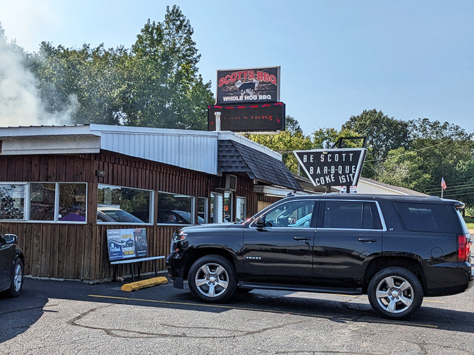 This simple wooden structure along the highway houses whole hog mastery that's worth every mile of your journey. 
