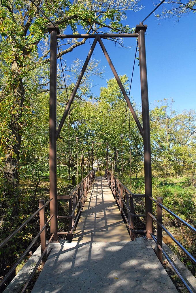Take a peaceful stroll across this charming suspension bridge, surrounded by lush greenery and the scenic natural beauty of Beatrice.