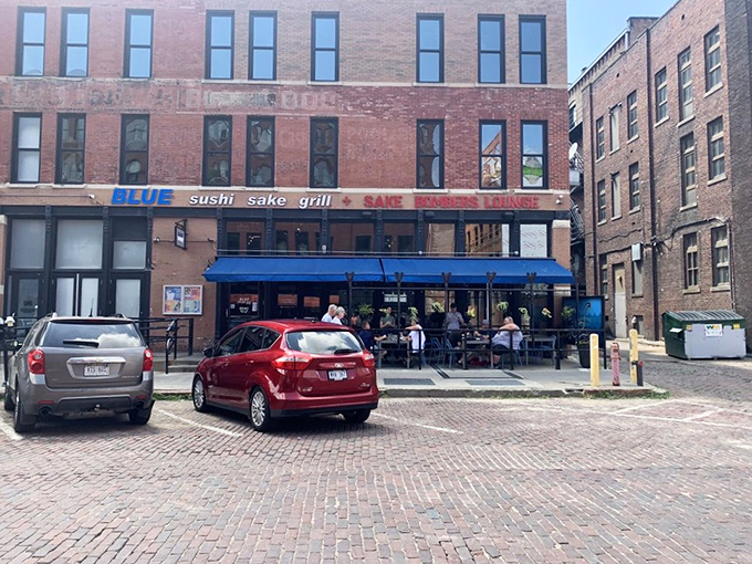 Blue Sushi Sake Grill: That vibrant blue awning is your first clue that something special awaits in this brick-lined corner of Omaha.