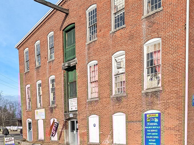 Sunshine filters through the trees while bargain hunters examine merchandise. It's like a scavenger hunt where everyone wins something!