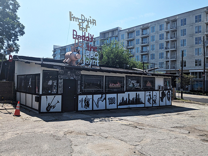 Fox Bros' covered patio – where strangers become friends over brisket and cold beer. The American flag adds a patriotic touch to your meat sweats.