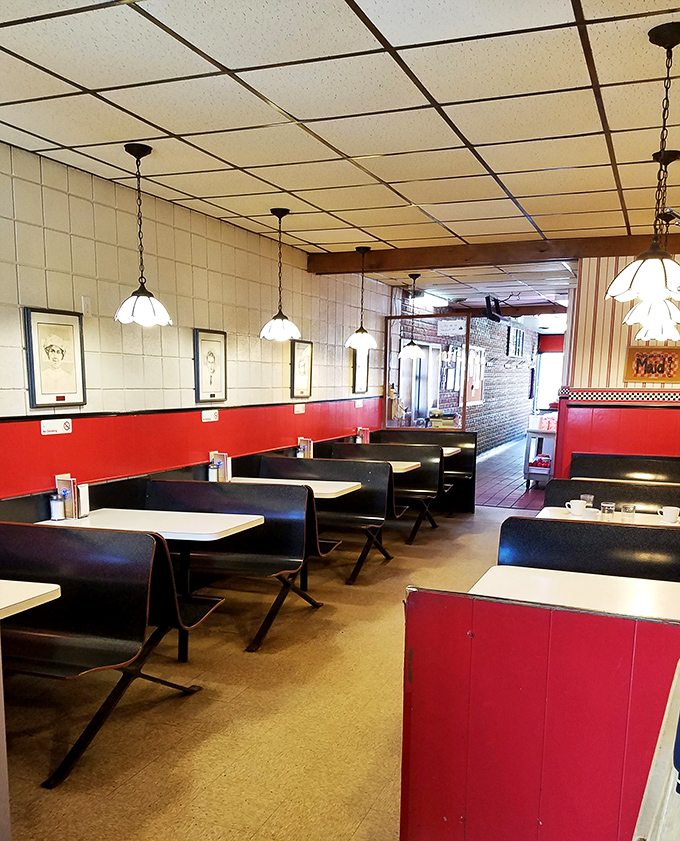 Inside those classic red booths, generations of Iowans have experienced the simple perfection of Maid-Rite's legendary loose meat sandwiches.