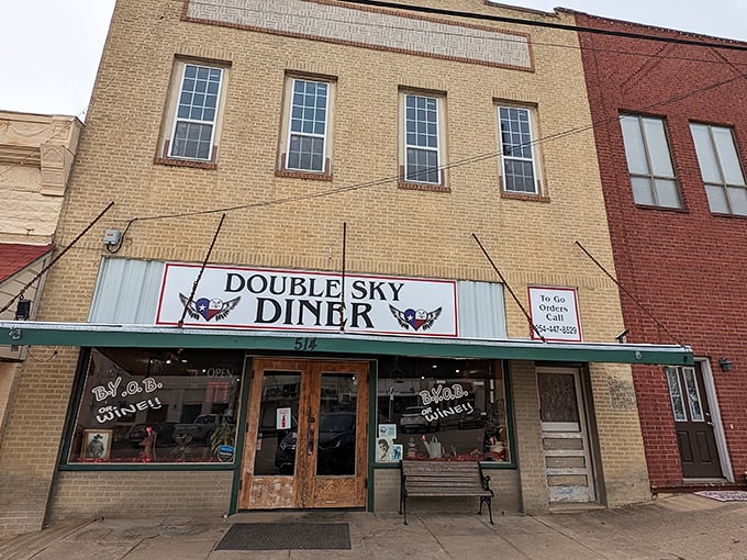 The hand-painted windows at Double Sky Diner promise B.Y.O.B – Bring Your Own Breakfast-appetite, that is.