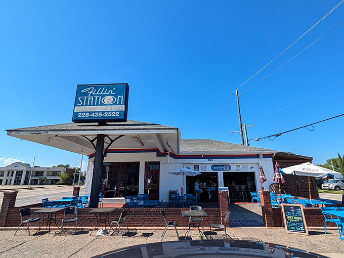 Bright blue tables outside the Fillin' Station invite you to enjoy Gulf treasures in the Mississippi sunshine. 