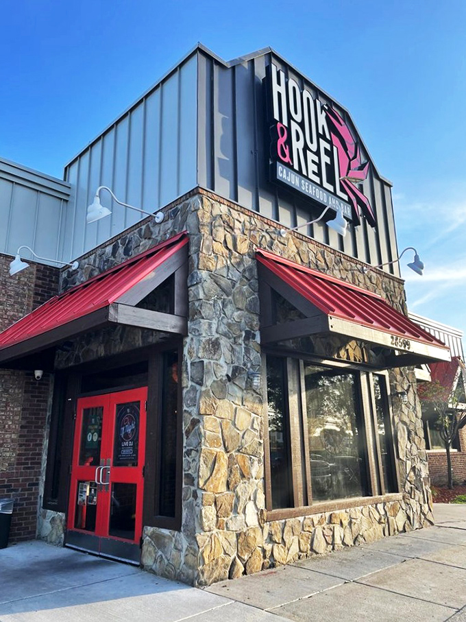 That stone facade isn't just architectural flair – it's the fortress protecting some of Michigan's most flavorful Cajun treasures.