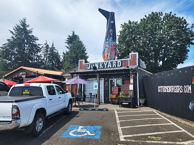 The "JUNKYARD" sign promises exactly what it delivers: gloriously excessive creations assembled from the finest ingredient scrapheap.