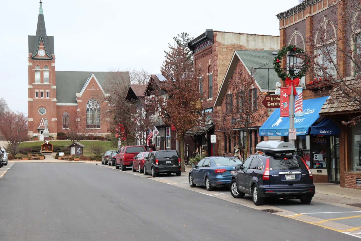 The red brick church in New Glarus stands watch over a town where Swiss heritage is celebrated with every flower box and bratwurst.