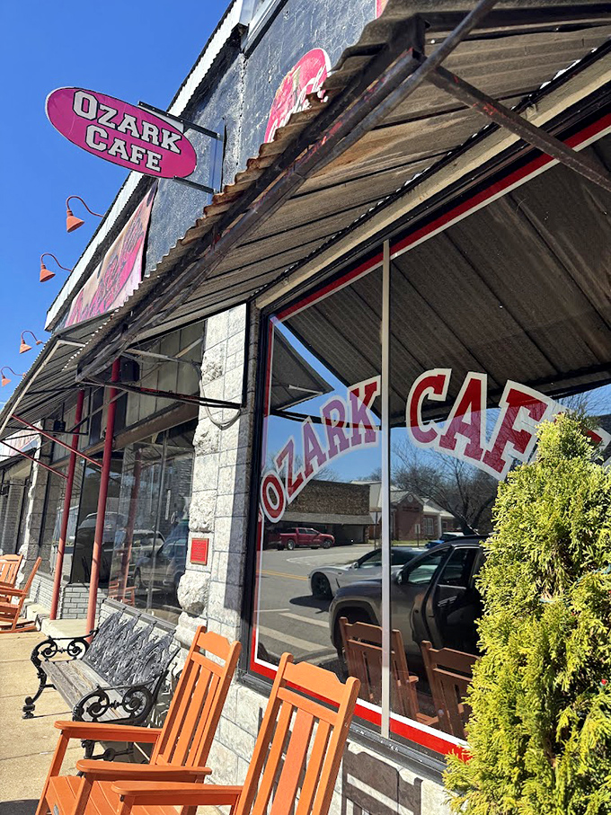 Those wooden rocking chairs outside Ozark Cafe aren't just seating—they're an invitation to slow down and savor life.