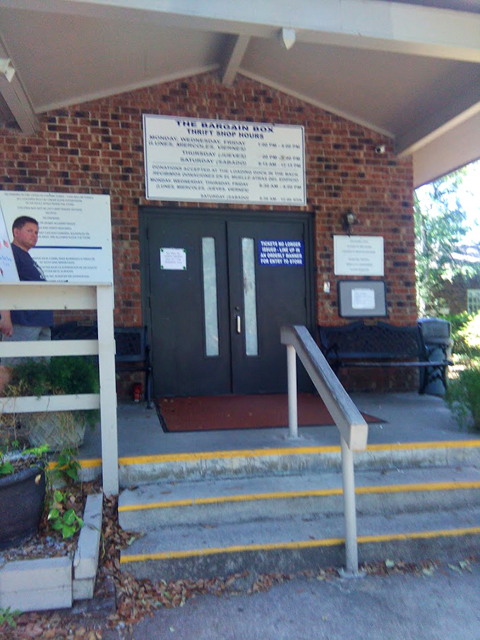 Blue doors that might as well be labeled "Portal to Thrifting Nirvana." The Bargain Box's modest exterior conceals extraordinary possibilities.