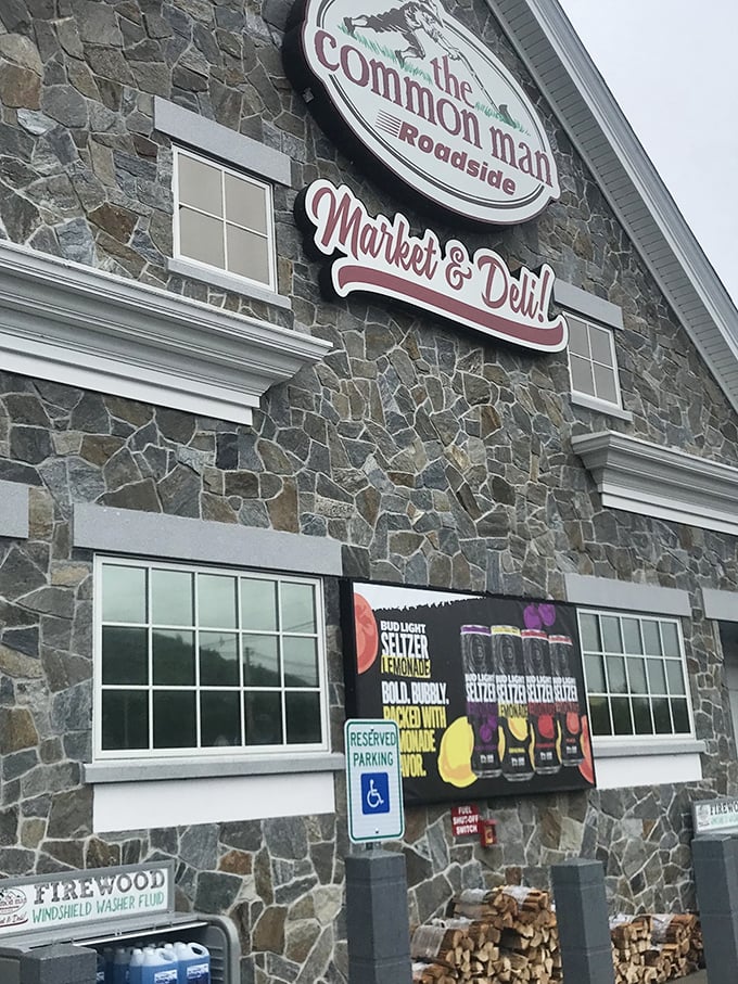 Stone walls and wooden beams frame a sandwich experience that turns roadside dining into a destination event.