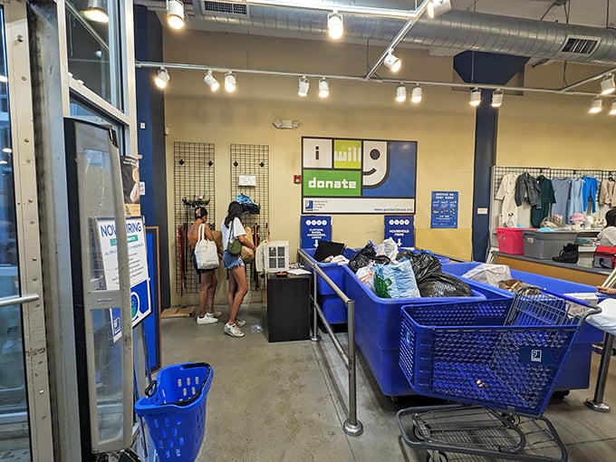Inside this Goodwill, blue shopping carts stand ready for bargain-hunting missions that support community programs.