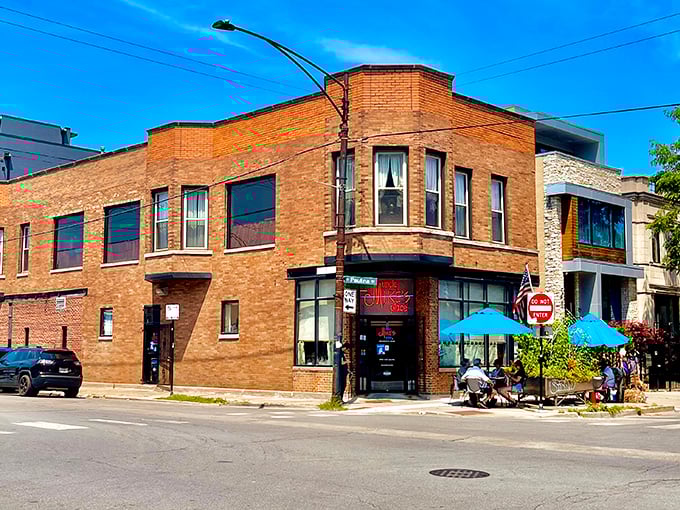 Sunlight bathes Uncle Mike's brick exterior as breakfast seekers gather. The neighborhood's worst-kept delicious secret.