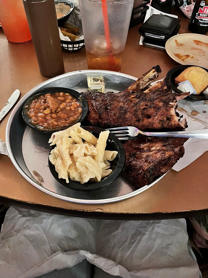 Ribs that make you forget table manners exist. The mac and cheese is creamy enough to make a grown person weep.