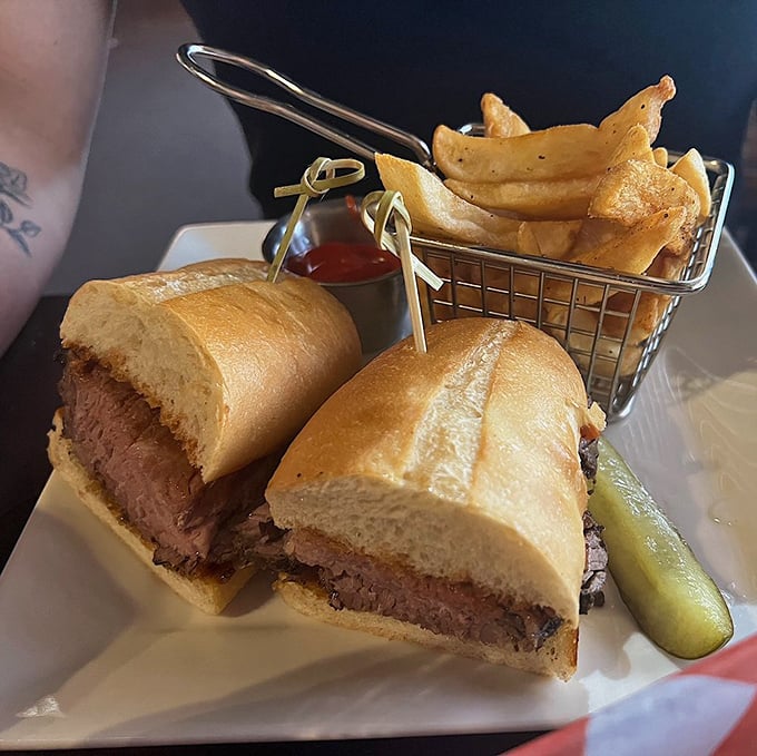 This tri-tip sandwich isn't just lunch; it's a masterclass in simplicity&mdash;tender meat, fresh bread, and a pickle that knows its supporting role.