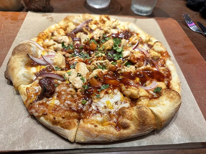 This BBQ pizza isn't just food&mdash;it's performance art with caramelized onions, tender chicken, and a sauce that strikes the perfect balance between sweet and tangy.