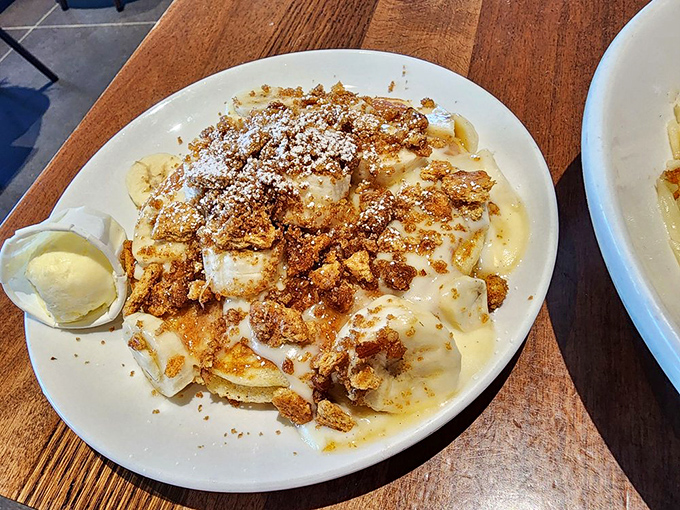 A classic buttermilk pancake dusted with powdered sugar&mdash;sometimes the simplest performances deserve the standing ovation. 