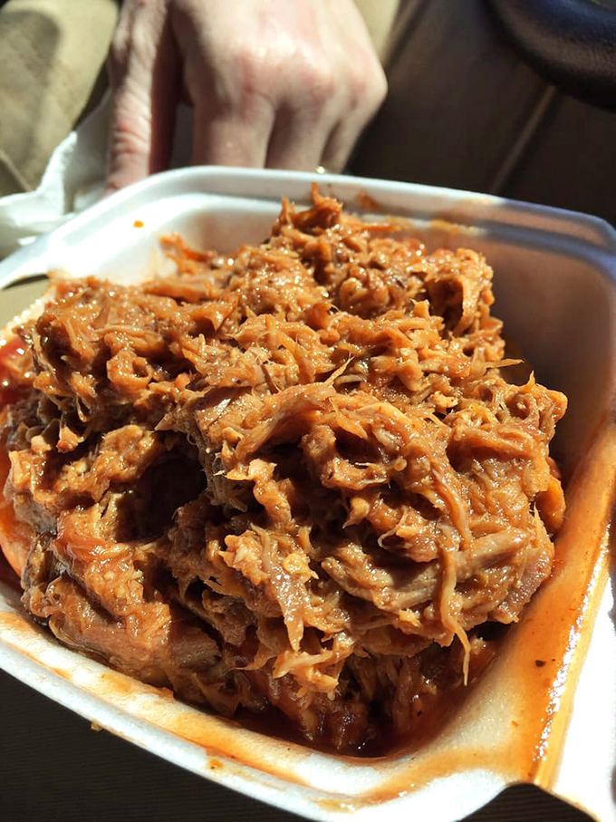 The chicken sandwich with sides that would make any Southern grandmother nod in approval. This is what comfort looks like on a plate.