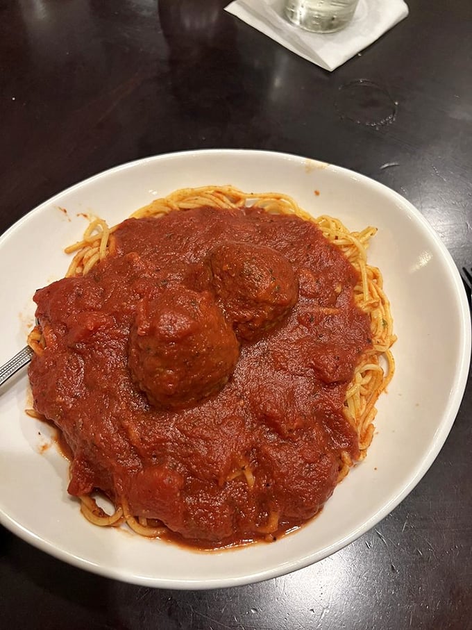 When spaghetti and meatballs get the royal treatment: abundant sauce, tender pasta, and meatballs so perfect they deserve their own Instagram account.