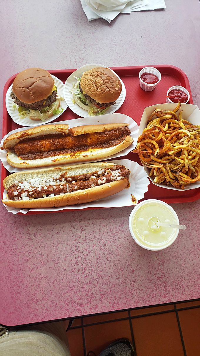 Two chili dogs, two burgers, and a mountain of curly fries&mdash;not a balanced meal by any nutritionist's standards, but a perfect one by mine.