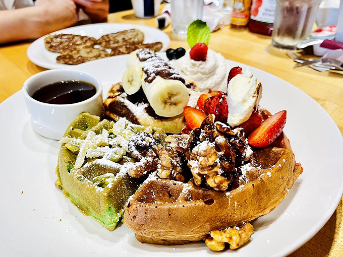 Dessert masquerading as breakfast? This waffle masterpiece with fresh fruit and nuts makes a compelling case for starting your day with joy.