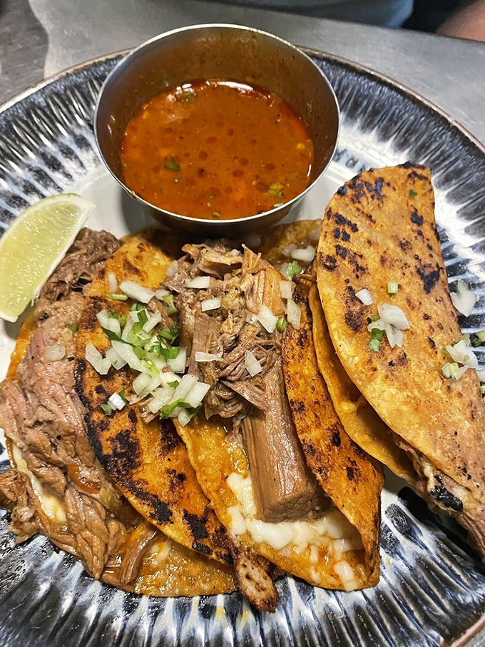 These birria tacos aren't just a meal&mdash;they're an experience. Crispy, meaty perfection with consomm&eacute; for dunking.