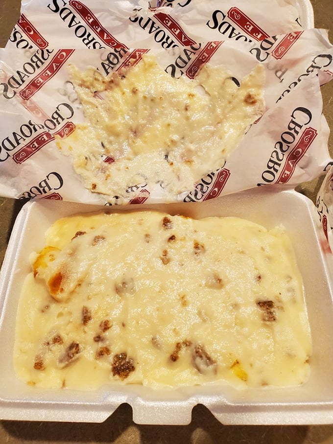 The holy trinity of Southern breakfast: biscuits that could float away if not anchored by gravy dense enough to have its own zip code.