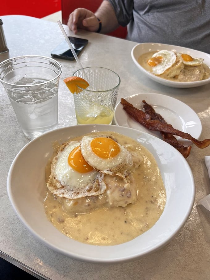 Biscuits and gravy with a side of sunshine. That golden yolk is just waiting to break and create a sauce so good you'll want to write home about it.