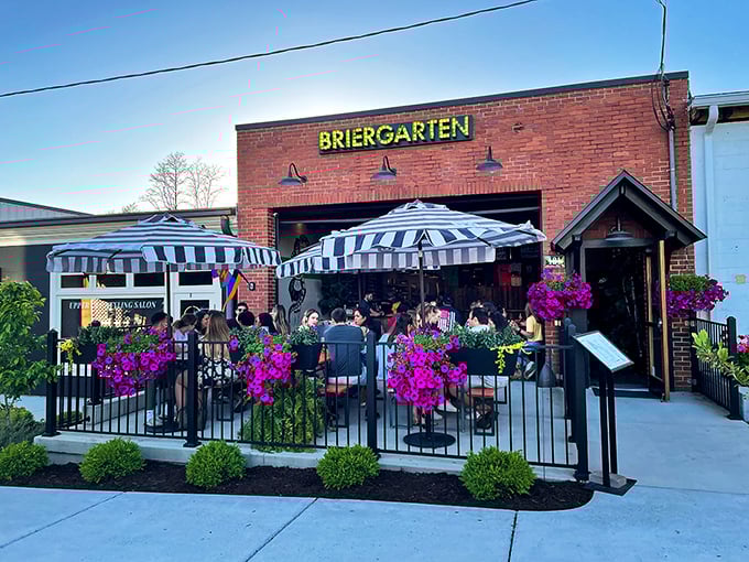 Briergarten's outdoor patio blooms with purple flowers and striped umbrellas &ndash; the perfect setting for craft beers and German-inspired fare.