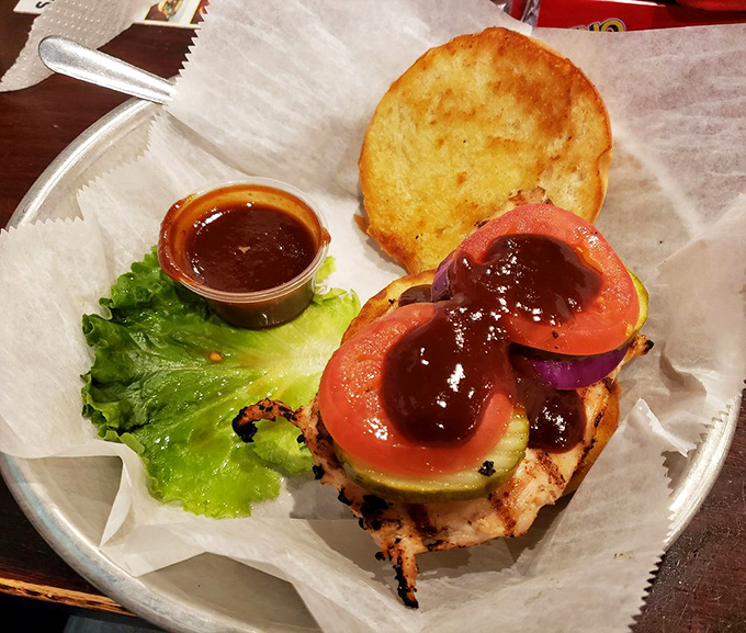 The chicken sandwich isn't playing second fiddle to anyone—with that perfect char and BBQ glaze, it's staging a delicious coup against beef supremacy.