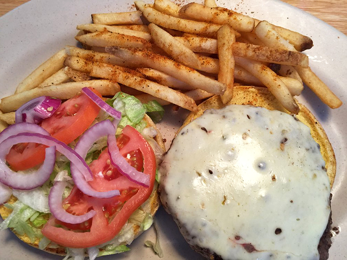 Fresh veggies, melted cheese, and a perfectly toasted bun&mdash;this burger has achieved the holy trinity of handheld perfection.