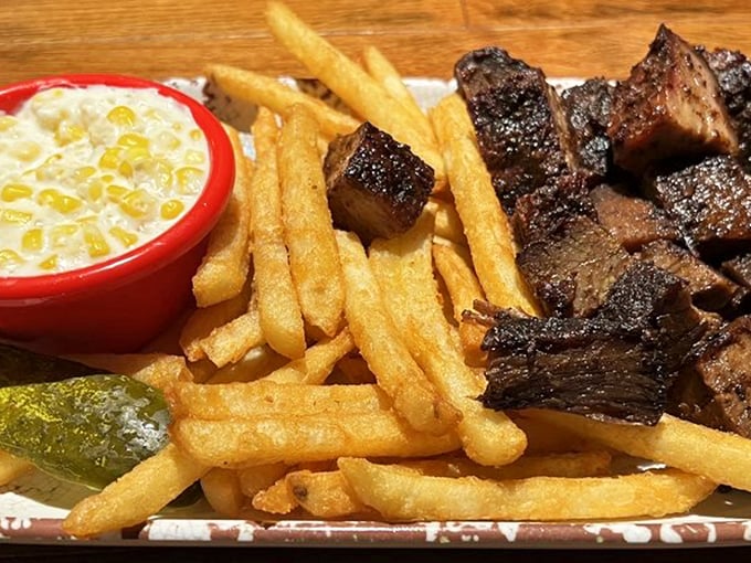 Burnt ends &ndash; those magnificent meat candy cubes &ndash; paired with golden fries and creamy corn. The holy trinity of barbecue bliss.