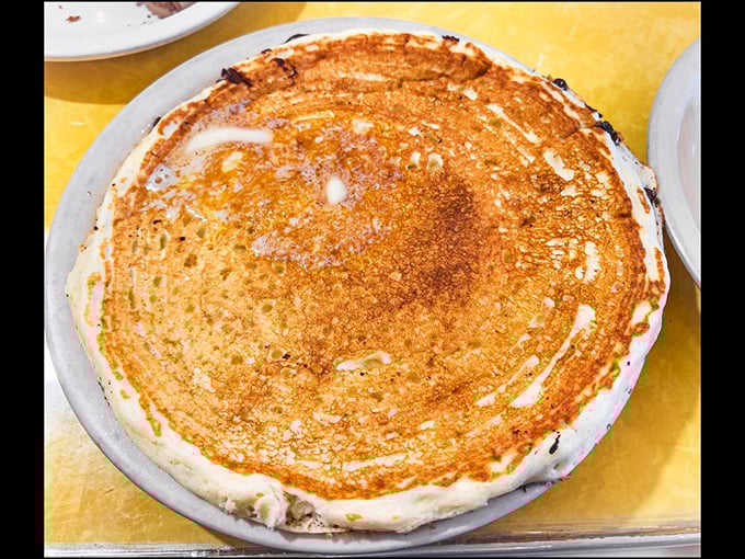 The buttermilk pancake that launched a thousand imitations. Look at that perfect color&mdash;like a sunrise captured in carb form.