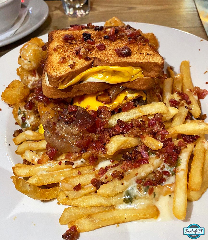 Toast standing in for buns? Genius! This burger monstrosity isn't just a meal&mdash;it's a commitment ceremony between you and your appetite.