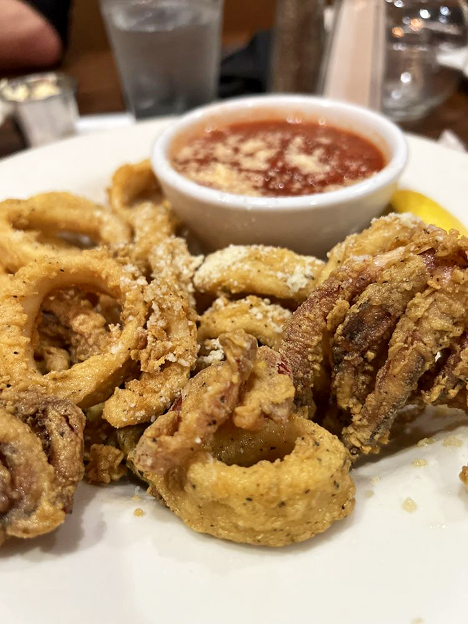 Golden-fried calamari that's actually tender, not rubber bands in disguise&mdash;served with a marinara sauce worth drinking when nobody's looking.