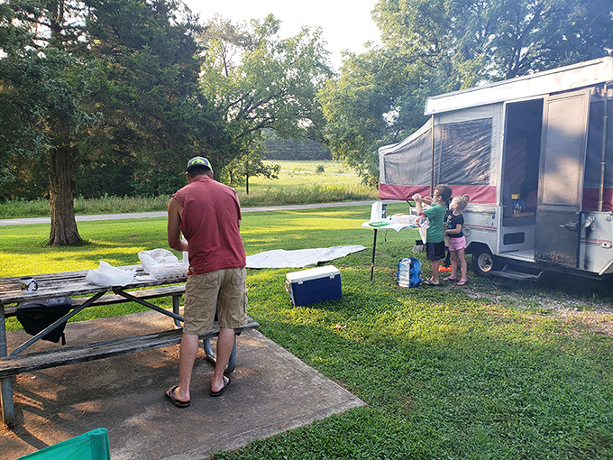 Family camping traditions in the making. The pop-up camper brings just enough civilization while still letting you claim you're "outdoorsy."