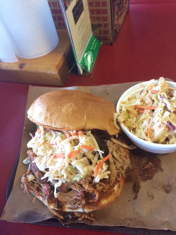 Coleslaw crowning glory! This Carolina-style sandwich demonstrates why vegetables occasionally deserve admission to the meat party.