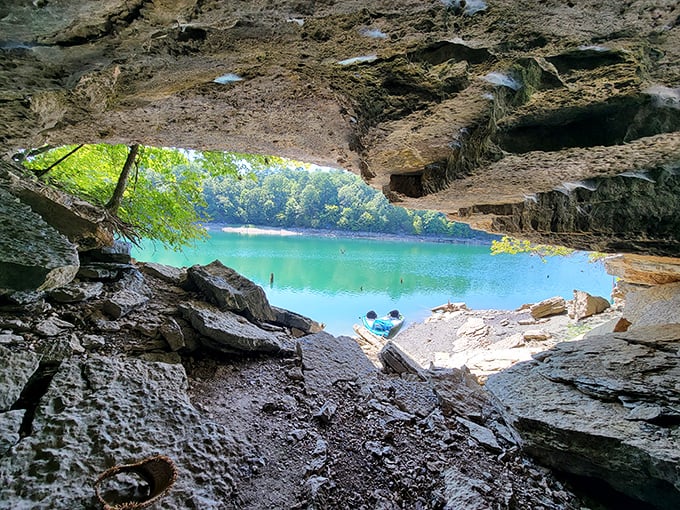 Nature's perfect frame: a limestone cave offering a window to paradise. The kind of view that makes you forget to check your phone.