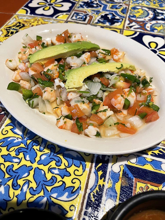Ceviche that practically dances with freshness&mdash;tender shrimp, bright tomatoes, crisp onions, and those perfect avocado slices that make everything better.