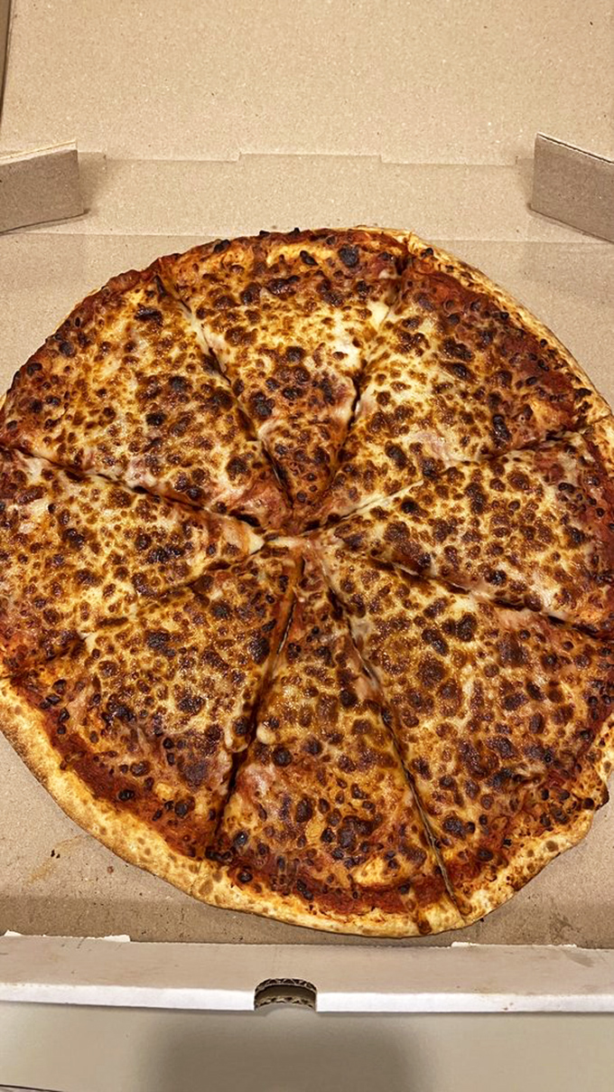 Pizza purists might debate the merits, but when cheese bubbles to this perfect golden-brown finish, philosophical arguments take a backseat to pure enjoyment.