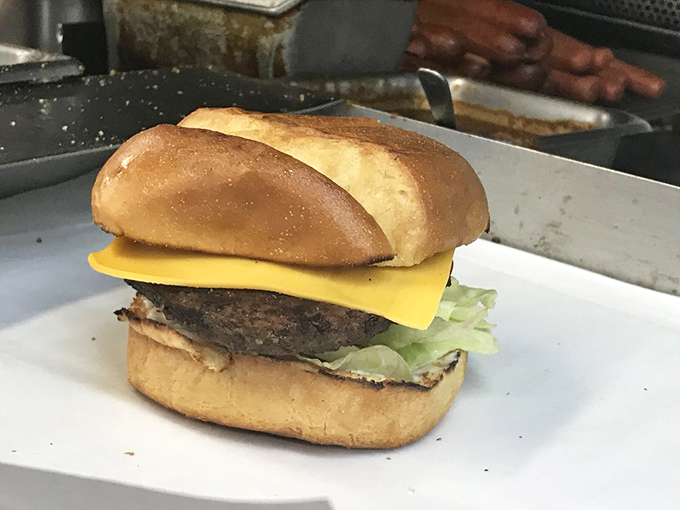 Sometimes the classics endure for a reason. This no-nonsense cheeseburger with its perfectly melted American cheese speaks a universal language of satisfaction.