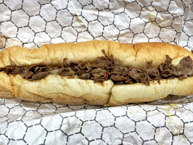 The classic cheesesteak in its natural habitat &ndash; wrapped in paper, ready to transport you 2,700 miles east with one bite.